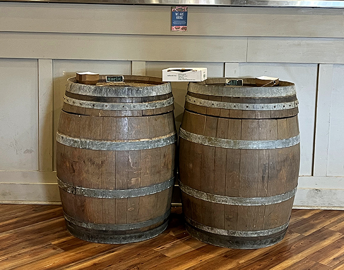 These wooden barrels aren't just decoration—they're pickle incubators where cucumbers fulfill their vinegary destiny. The deli equivalent of aging fine wine.