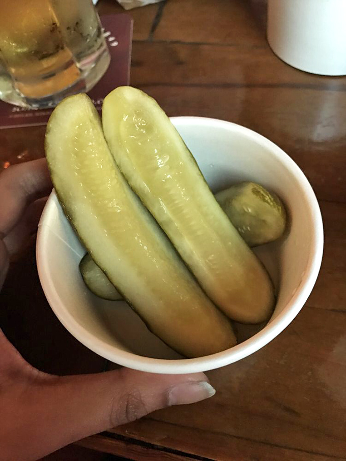 These aren't just pickles – they're palate cleansers between bites of fried glory, crisp and tangy ambassadors from the vegetable kingdom.