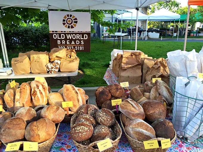 Farmers market magic. Old World Breads' pop-up stand proves that fresh bread in the great outdoors somehow tastes even better than indoors—science can't explain it.