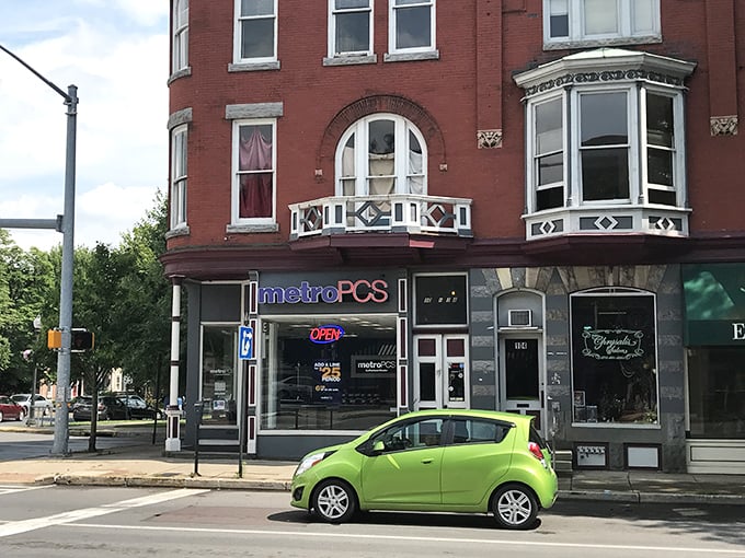 Corner stores in historic buildings tell Bloomsburg's story of adaptation—Victorian elegance now houses modern necessities while preserving architectural character.