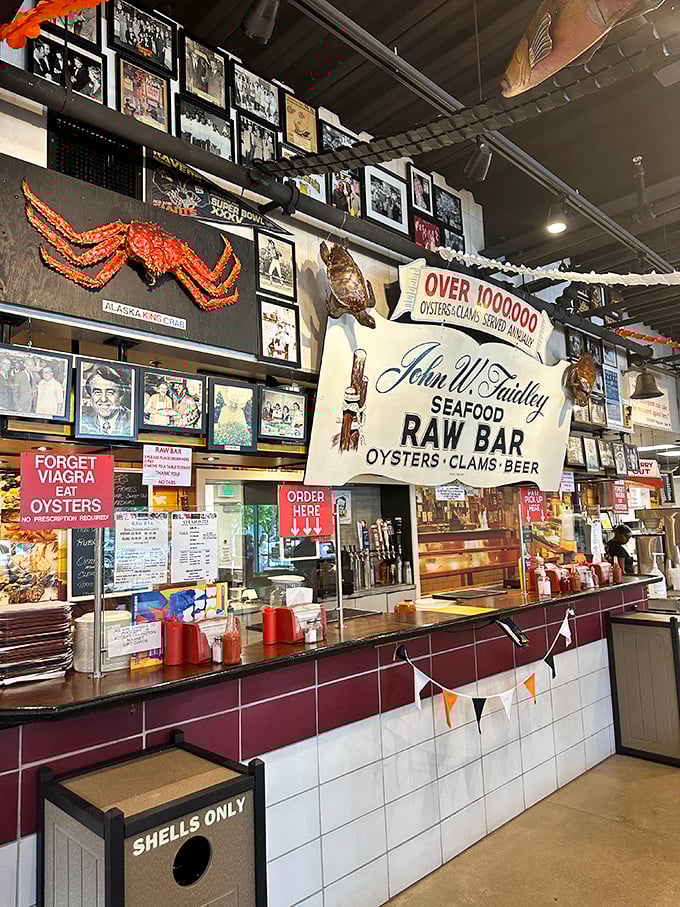 The raw bar wall, where oyster wisdom and seafood humor collide. "Forget Viagra, Eat Oysters" might be the most Baltimore health advice ever given.