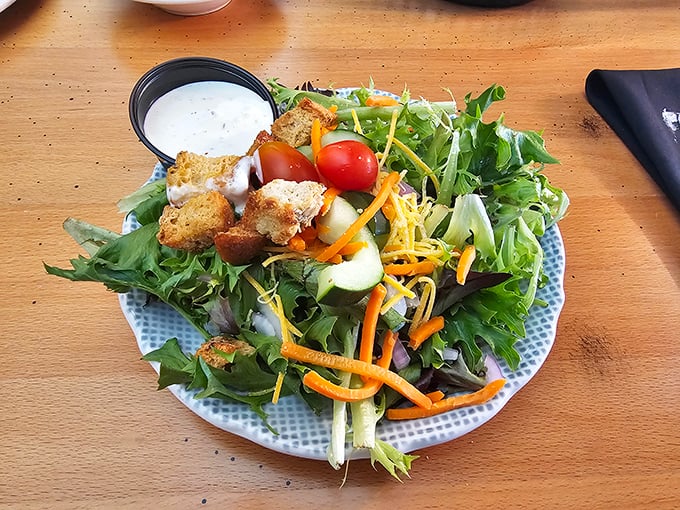 A garden on a plate—this salad brings vibrant colors and textures together in a fresh counterpoint to the tavern's heartier offerings.