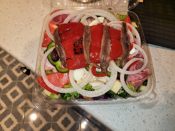 This isn't just any salad – it's the token healthy option that somehow still feels indulgent when enjoyed alongside Philly's finest.