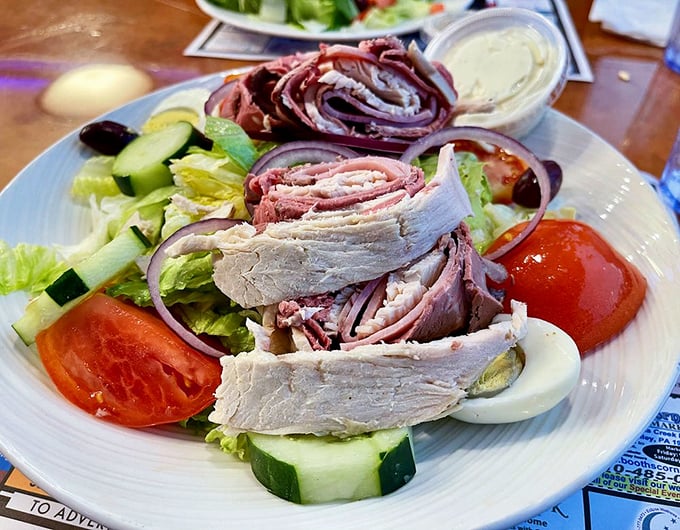 This isn't just a salad—it's protein with purpose. Those rolled meats and fresh vegetables create the perfect balance of virtue and indulgence. 