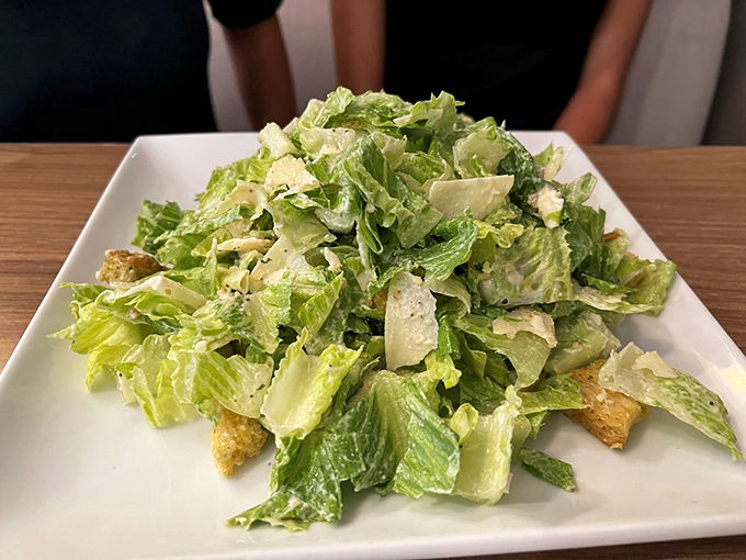 A proper Caesar salad is like a good haircut—simple, classic, and makes you feel better about yourself even though nothing's really changed.