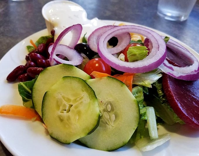 Even the salad deserves respect here—fresh, colorful, and ready to balance out your seafood extravaganza.