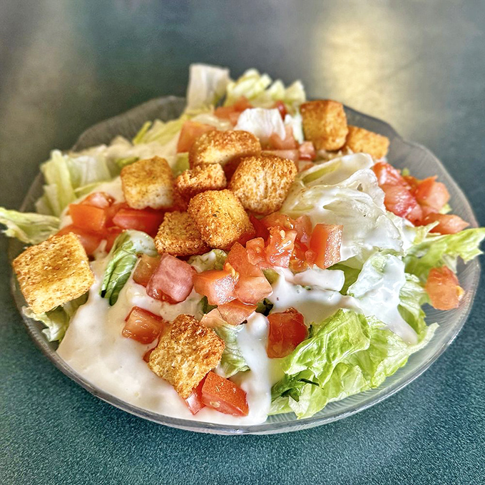 A salad that doesn't apologize for being a salad. Those golden croutons are like little life rafts in a sea of virtue.