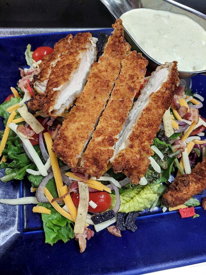 A salad that doesn't apologize for being healthy – crisp, colorful, and substantial enough to satisfy even in a temple of comfort food.