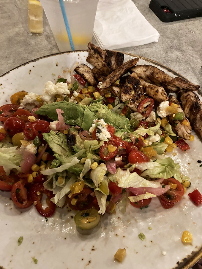 A salad that doesn't apologize for being healthy—bright, beautiful, and paired with perfectly grilled protein for those "I should eat something green" moments.