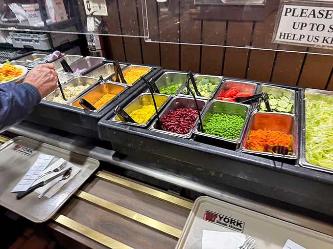 The salad station offers fresh ingredients that let you customize your greens exactly how you like.