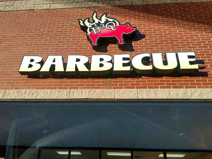 The B3Q sign stands as a beacon of hope for the hungry. That flaming pig logo is basically a bat signal for barbecue lovers.