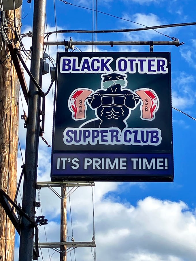 The Black Otter mascot proudly stands guard above the entrance—a silent promise of the culinary treasures waiting inside.