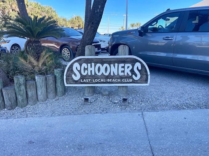 The sign that locals point to when out-of-towners ask, "Where should we eat?" – simple, straightforward, and promising good times ahead.
