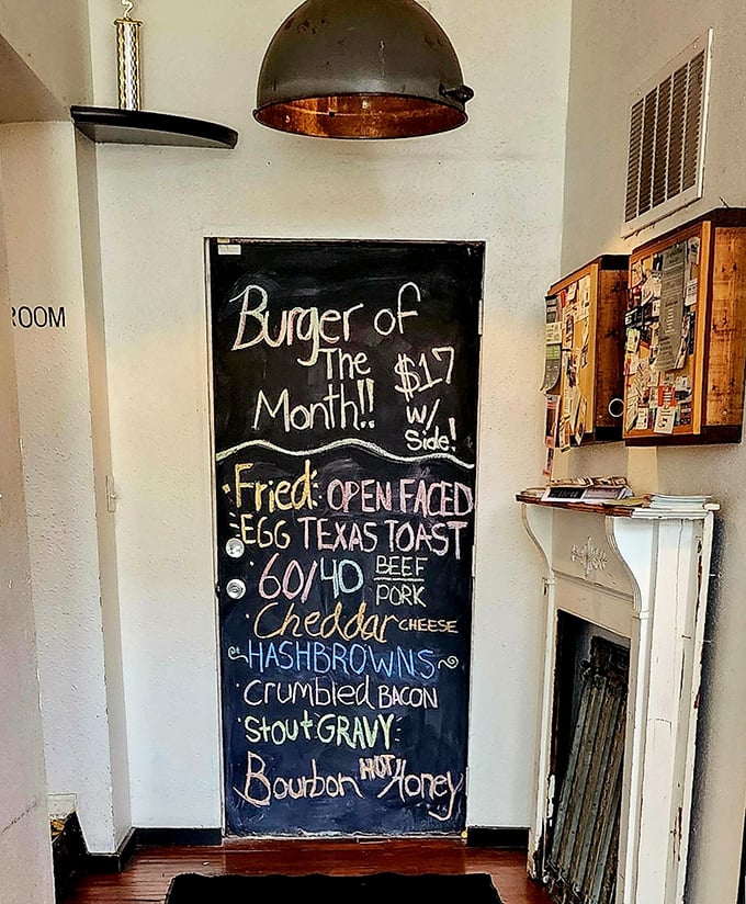 The "Burger of the Month" chalkboard reads like poetry—fried egg, Texas toast, and bourbon honey that would make Shakespeare drool.