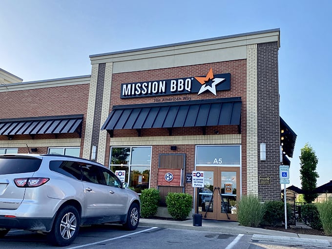 The Tennessee flag-adorned entrance promises a uniquely American experience where patriotism and pulled pork create the perfect union.