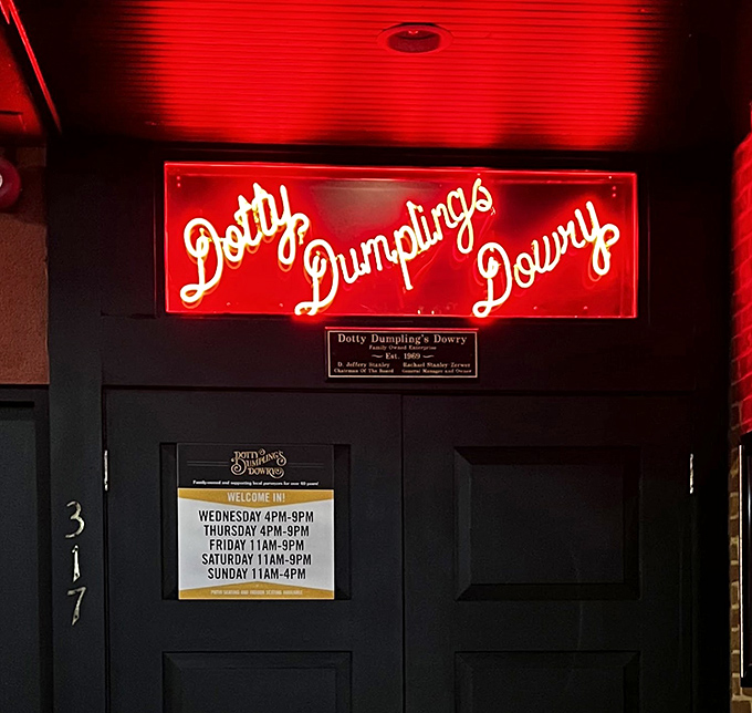 The glowing red neon sign promises more than just a meal—it's an invitation to step into a Madison institution where time slows down. 