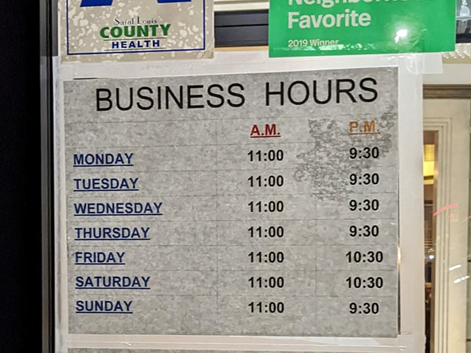Business hours posted like a treasure map – X marks the spot where hunger meets satisfaction seven days a week.