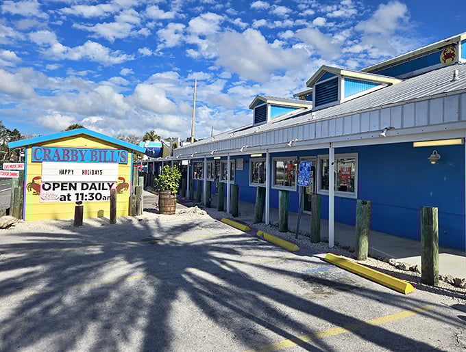 The cheerful exterior announces "Open Daily"—three syllables that have brought joy to seafood lovers for generations of Florida vacations.