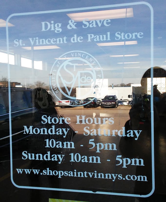 The rules of engagement—store hours posted like a promise of adventure, seven days a week for the dedicated treasure hunter.