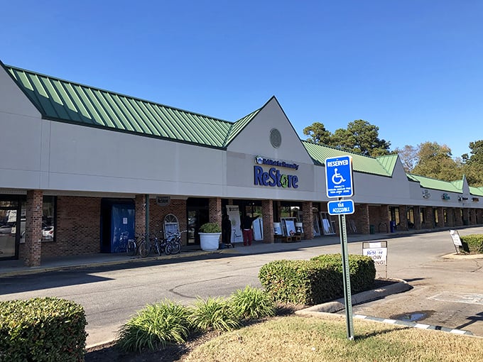 The ReStore's welcoming façade stands ready for treasure hunters, like the entrance to an archaeological dig where the artifacts are someone's former living room set.