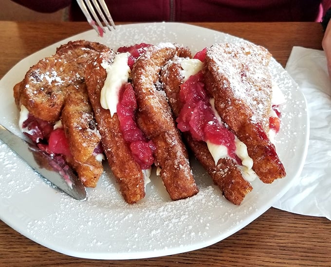 This isn't just French toast—it's a berry-stuffed breakfast masterpiece that makes ordinary morning meals seem like sad, distant memories.