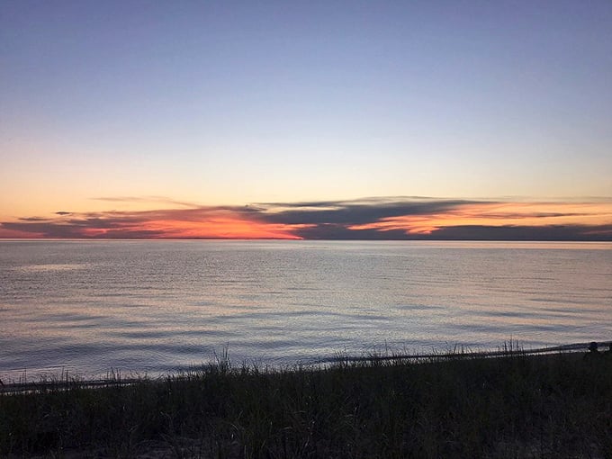 Sunsets here don't just end the day—they celebrate it. Lake Michigan turns into liquid gold while the sky performs its nightly color symphony.