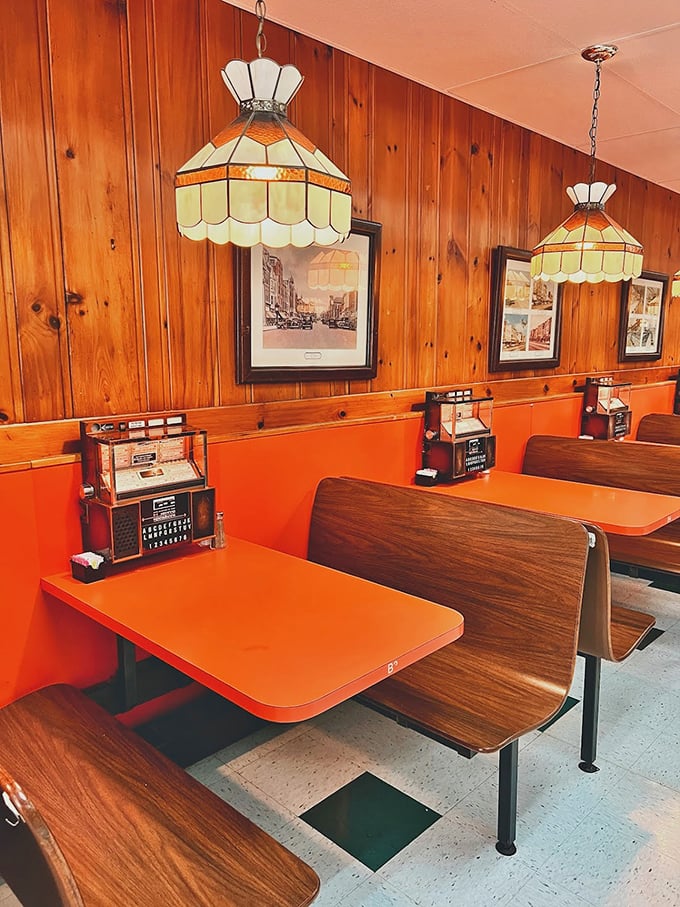 These booths aren't designed for Instagram—they're engineered for the perfect lean-in conversation over food that demands your full attention.