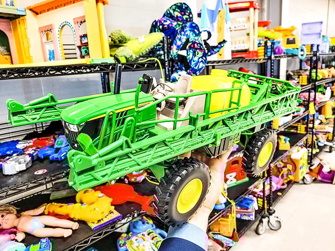 Toy department jackpot! That green farm equipment would make any kid (or nostalgic adult) the hero of the sandbox.