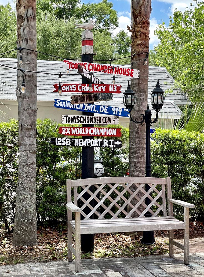 A sign that boasts "3X World Champion"—because when you've mastered chowder to this degree, you deserve to display your trophies where everyone can see them.