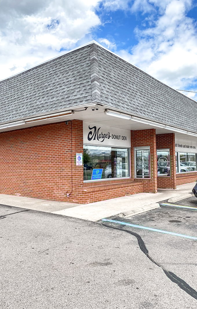 The corner entrance has welcomed generations of Michigan families seeking comfort in the form of perfectly fried dough.