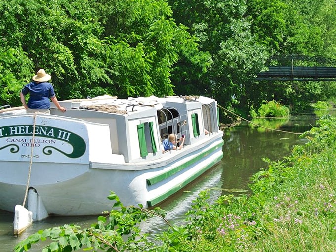 The St. Helena canal boat glides through Canal Fulton's waters just as it did a century ago – history floating right before your eyes.