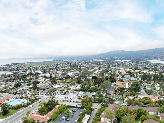 From above, Carpinteria reveals its perfect positioning—nestled between mountains and sea, a small town that hit the geographic lottery.
