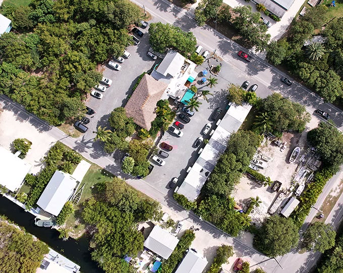 From above, No Name Pub blends into the lush landscape of Big Pine Key – a hidden treasure that's worth every wrong turn to discover.