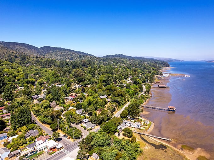 An aerial view reveals Inverness's perfect balance—close enough to civilization for comfort, far enough for affordable peace.