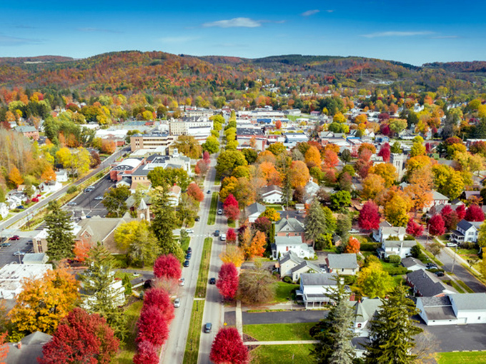 From above, Wellsboro reveals its true character—a perfect grid of streets embraced by Pennsylvania's rolling hills and painted with autumn's most spectacular colors.