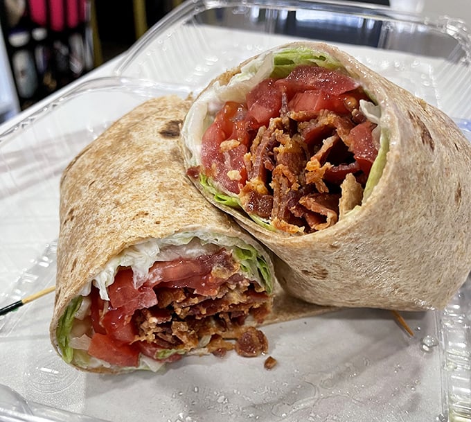 This wrap isn't just holding bacon, lettuce and tomato—it's cradling the holy trinity of sandwich ingredients with proper reverence.