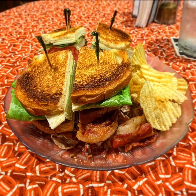 Not just a BLT – a towering monument to the perfect balance of crispy, fresh, and savory. Secured with toothpicks because greatness needs support.