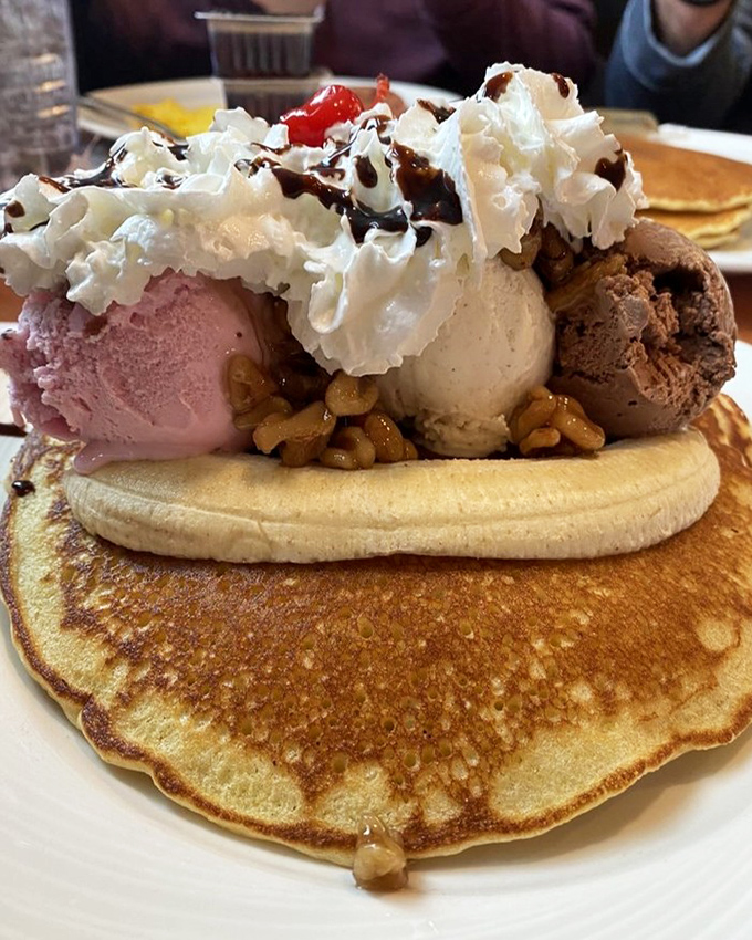 The banana split pancake isn't just dessert pretending to be breakfast—it's breakfast that graduated with honors from dessert university, complete with ice cream diploma.