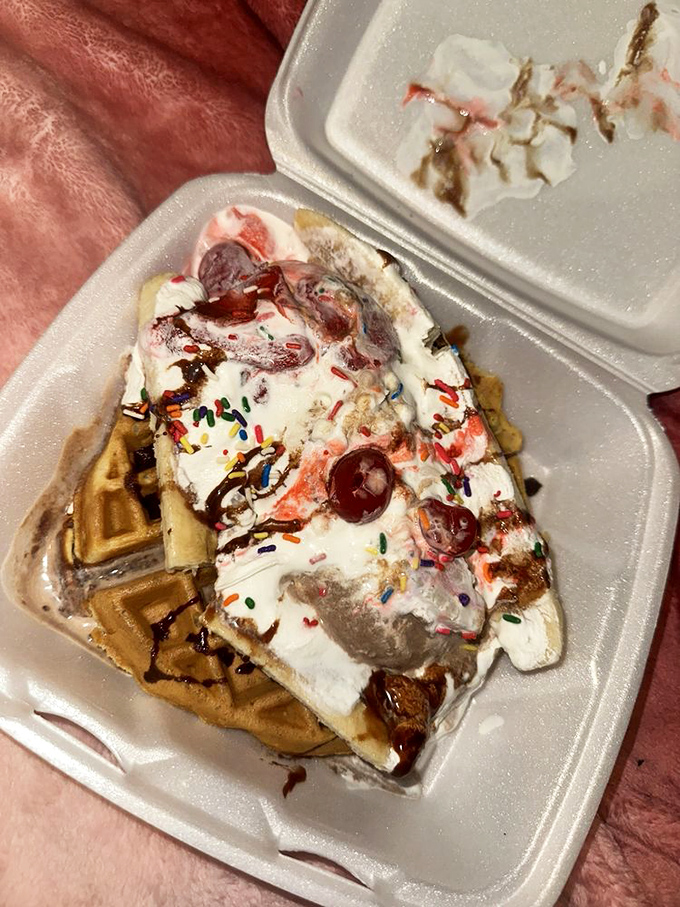 Not all heroes wear capes—some come in waffle form topped with ice cream, whipped cream, and sprinkles. Dessert nirvana in a takeout container.