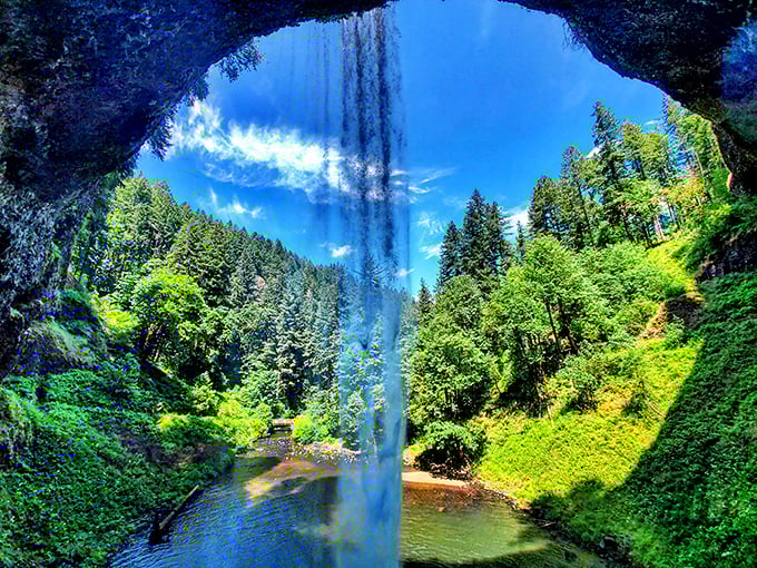 The ultimate reveal: Looking out from behind the waterfall offers a perspective that turns visitors into explorers and tourists into adventurers.