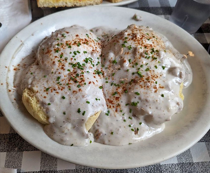 Biscuits hiding under a creamy avalanche of gravy. This isn't just breakfast—it's edible therapy for whatever ails you.