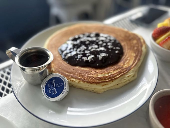 This isn't just a pancake—it's a canvas where blueberry meets maple in a breakfast masterpiece that makes you question why we don't eat breakfast for every meal.