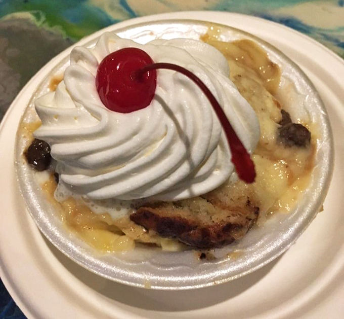 Bread pudding that would make your grandmother both jealous and proud—topped with a swirl of whipped cream and zero pretension.