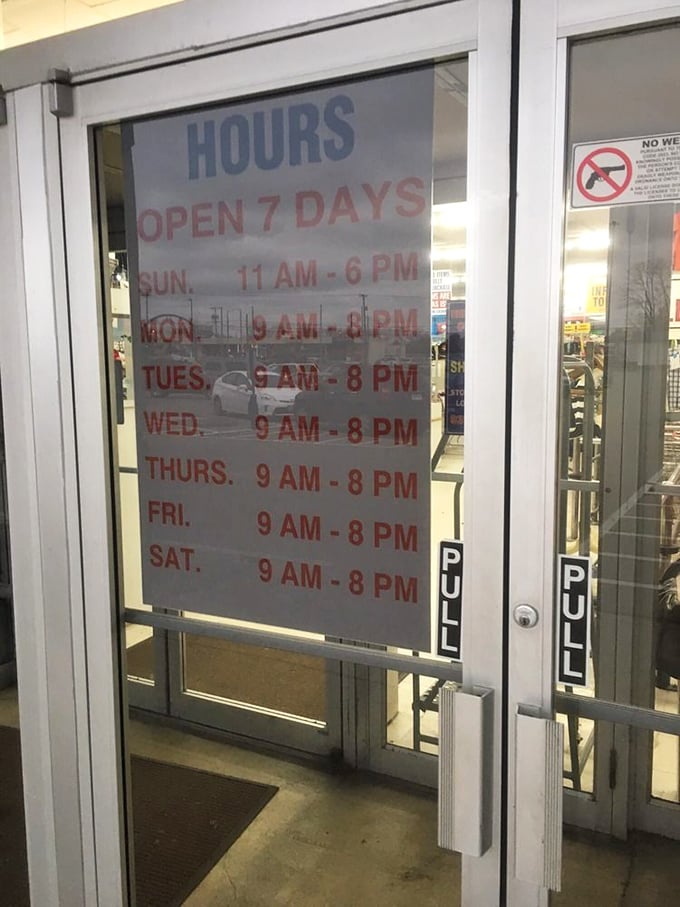 The store hours sign—a sacred text for dedicated thrifters who plan their week around fresh merchandise and colored tag sales.