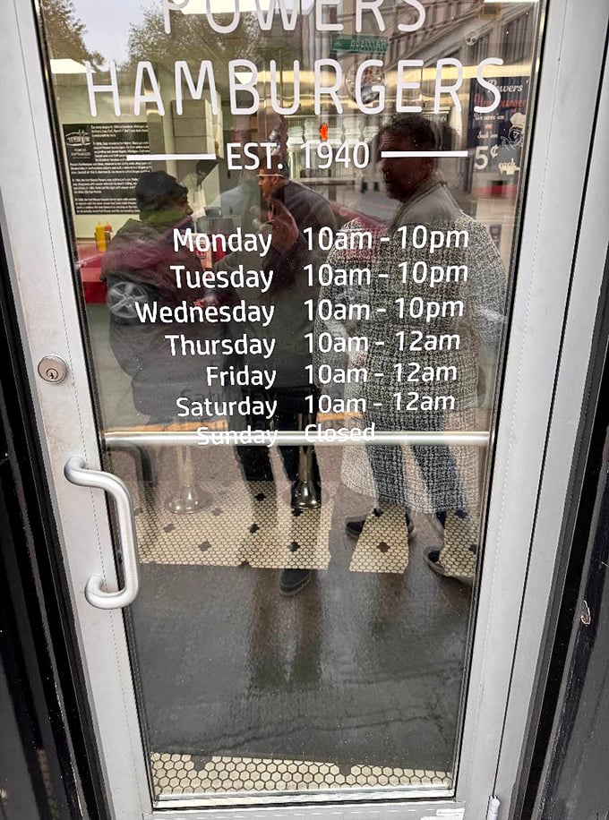 The hours posted on the door are more than just a schedule – they're a promise that Powers will be there when you need it, except Sundays when even burger legends need rest.
