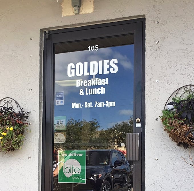 The door tells you everything you need to know: Breakfast, Lunch, and hours generous enough to accommodate both early birds and late risers.