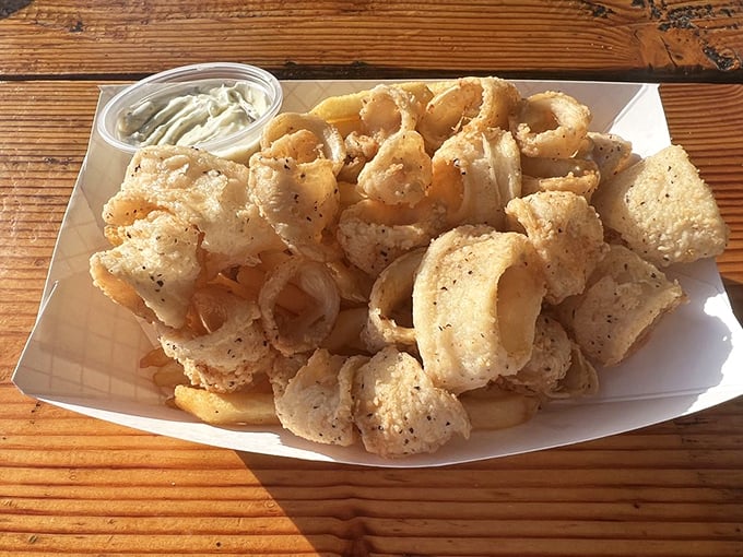 Crispy calamari that puts rubbery bar food versions to shame – tender inside, perfectly seasoned, and impossible to stop eating.