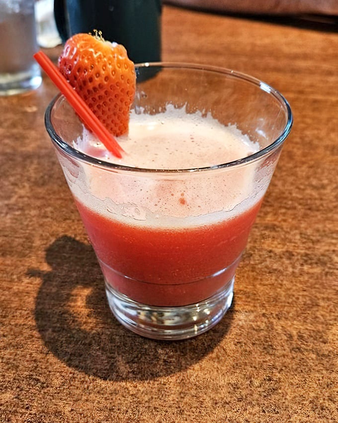 This strawberry cocktail isn't just a drink, it's morning sunshine in a glass—complete with a strawberry lifeguard perched on the rim.
