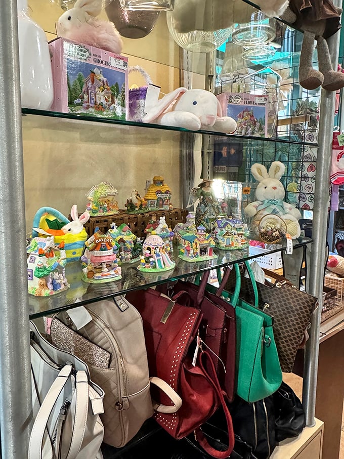 Seasonal treasures and designer handbags share space in this glass case – proof that Retique's inventory spans from practical to positively luxurious.