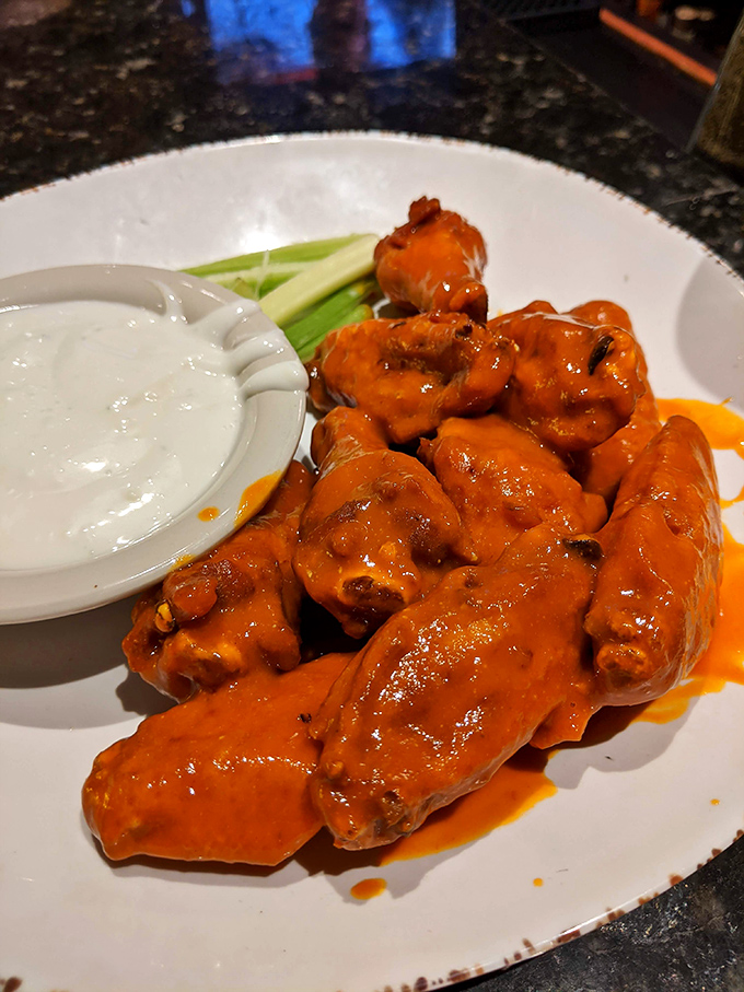 Wings that could make Buffalo jealous, served without irony or unnecessary truffle oil – just pure poultry perfection.